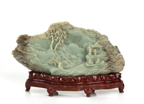Bonhams : A jade boulder carved with a scholars in a landscape