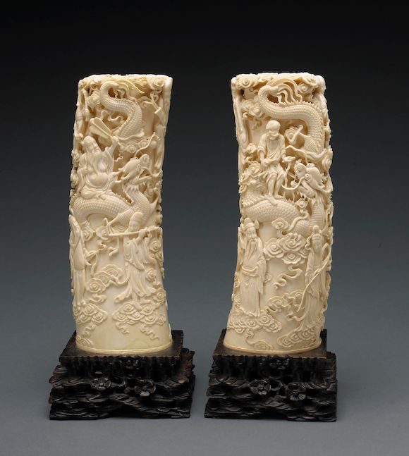 Bonhams : A pair of carved ivory tusk sections 20th Century