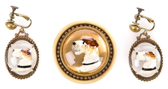 Bonhams : A reverse carved and painted intaglio Fox Terrier brooch with ...