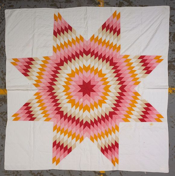 Bonhams : A pieced cotton 'Texas Star' quilt