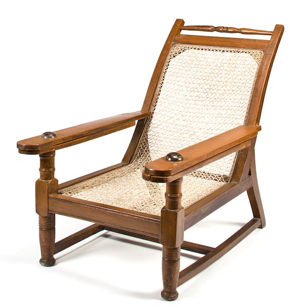 Bonhams : An African Tanzanian mninga plantation chair Mombasa, Kenya