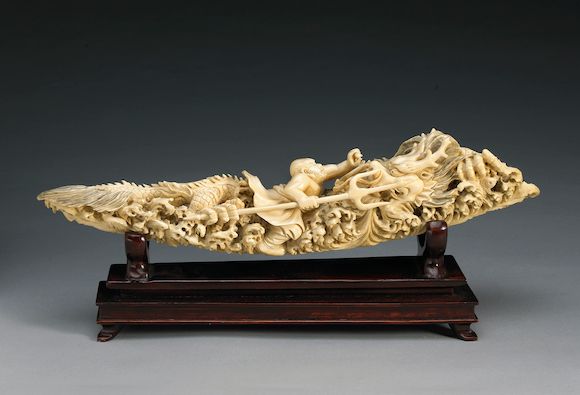 Bonhams : A carved ivory tusk of a monk slaying a dragon 20th Century