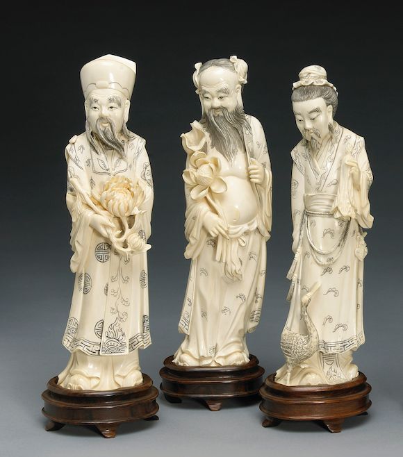 Bonhams : A group of three ivory bearded figures 20th Century