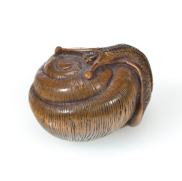 Bonhams : A wood netsuke of a snail By Hidari Issan, Edo period, 19th ...