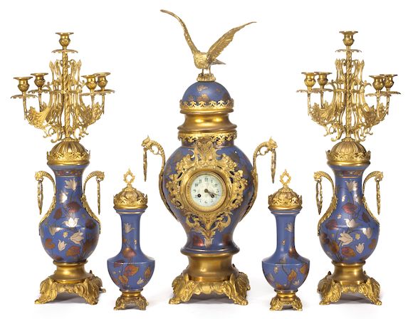 Bonhams : A Belgian gilt brass mounted earthenware five piece clock ...