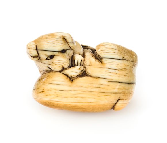 Bonhams : An ivory netsuke of a pair of Akita puppies By Masatomo, Edo ...