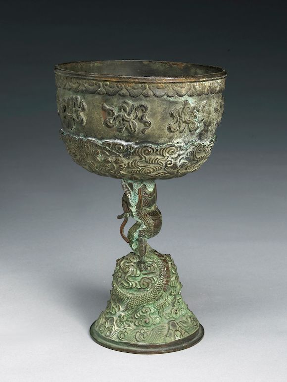 Bonhams : A copper alloy libation cup with Daoist motifs 18th/19th Century