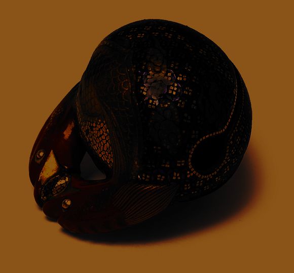 Bonhams : A Japanese netsuke decorated in gold, red and black lacquer ...