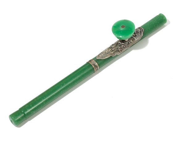 Bonhams : A green glass and metal-mounted opium pipe