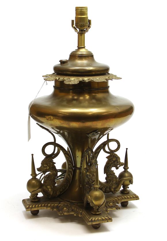 Bonhams : A Renaissance revival brass figural oil lamp