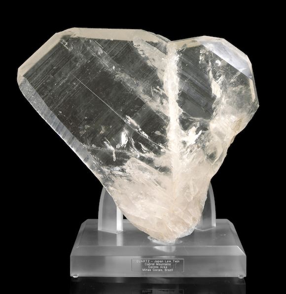 Bonhams : Spectacular Japan-Law Twinned Quartz Crystal on Base
