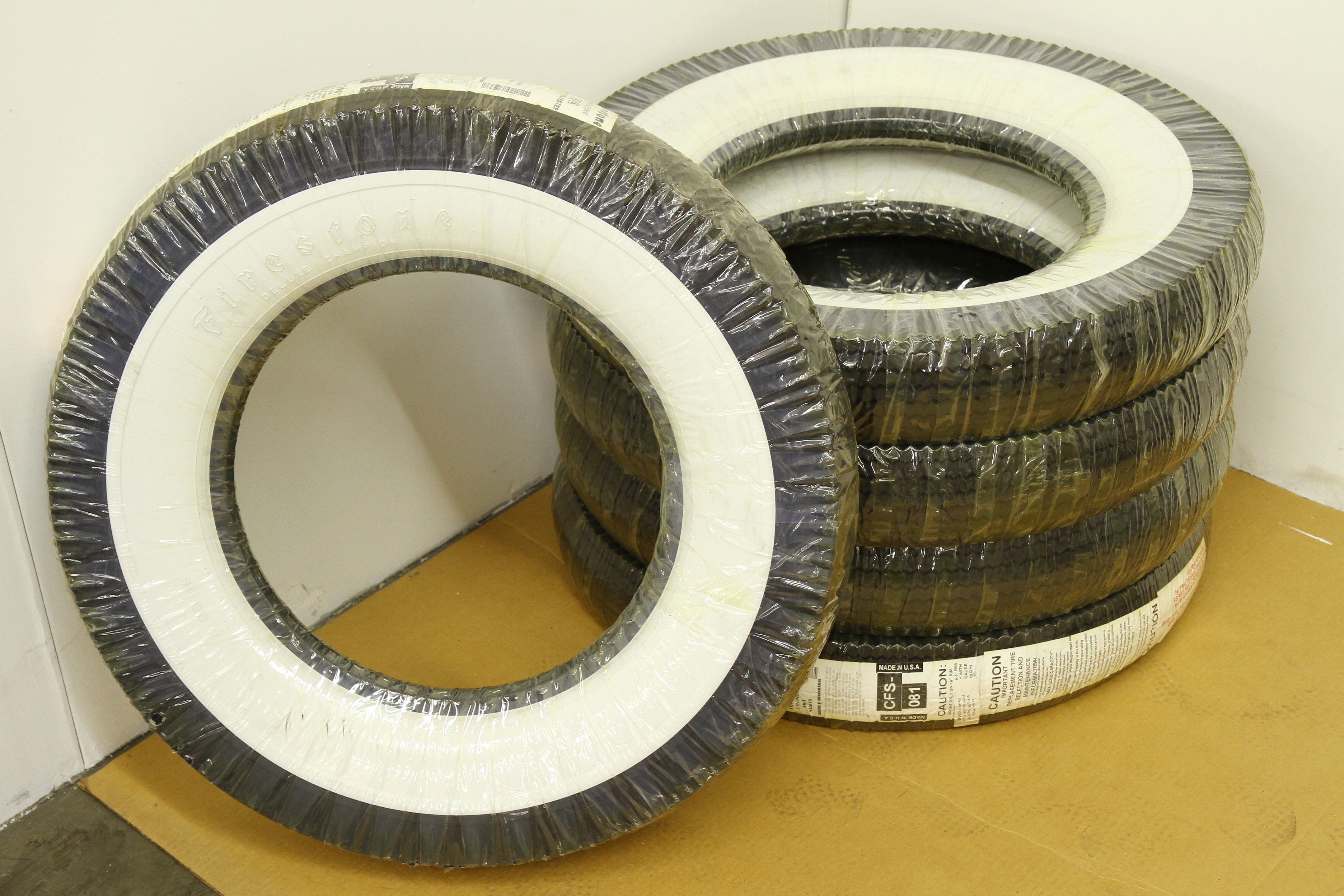 Bonhams Cars : A set of five 6.00-16 Firestone white wall tires,