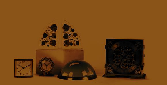 Bonhams : A group of six horological table decorations