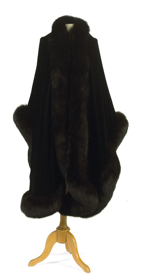 Bonhams : A black velveteen fur trimmed wrap