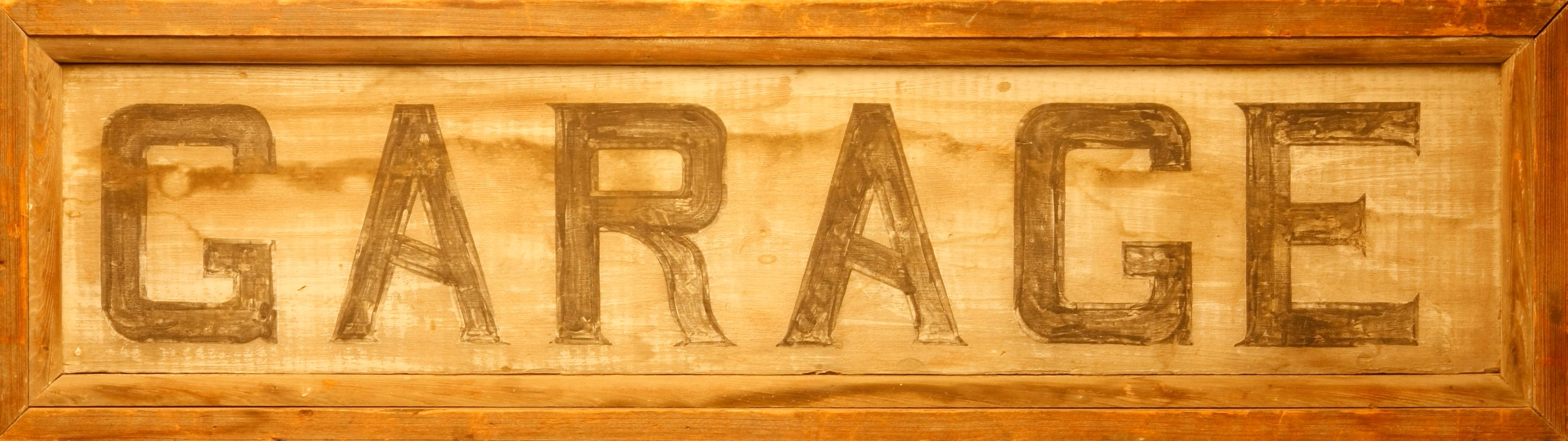 Bonhams Cars : A Vintage painted wood garage sign, circa 1920s