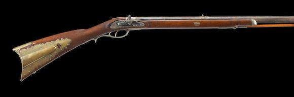 Bonhams : An American half-stock mule-ear percussion buck and ball gun