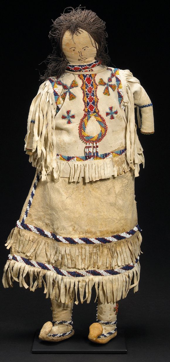 Bonhams : An Apache beaded doll