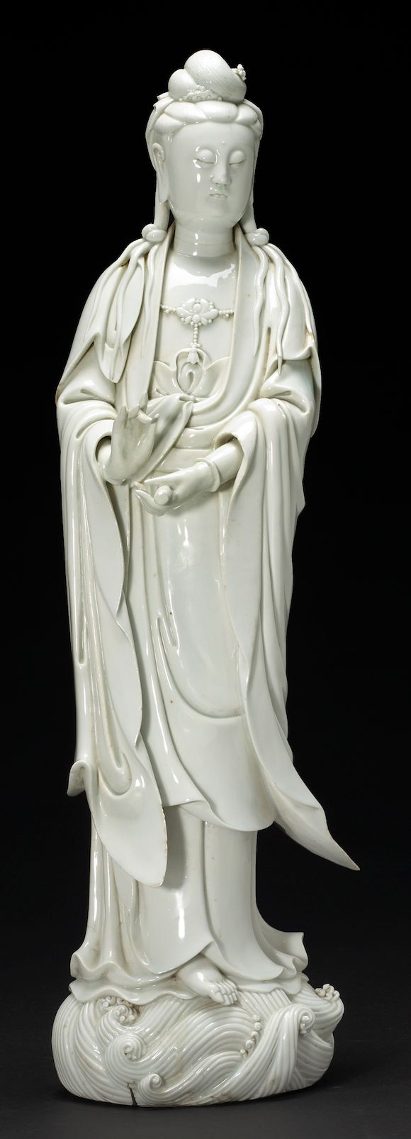 Bonhams : A Dehua porcelain figure of Guanyin Bo zhi yu ren Mark, 18th ...