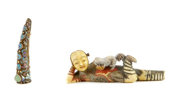 Bonhams : A Chinese polychrome ivory cane handle of a girl and dog and ...