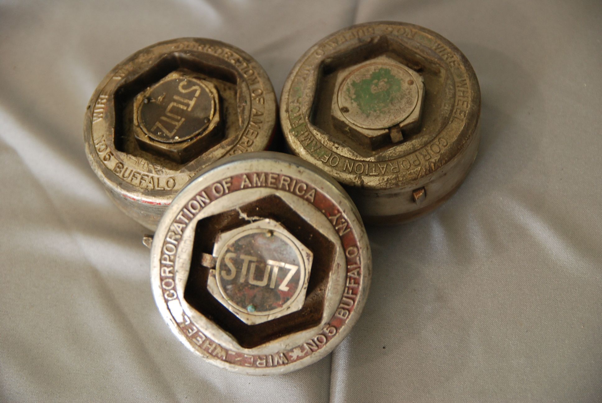 Bonhams Cars : A set of six Buffalo no. 5 Stutz wire wheel hub caps,