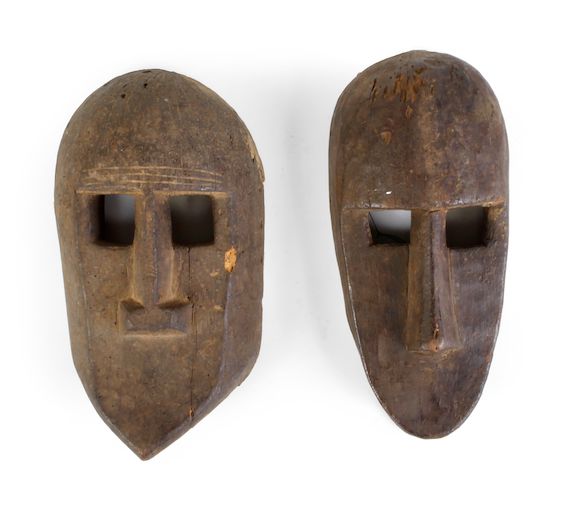 Bonhams : Three Mali Masks and a Dan Mask height of largest 17 inches