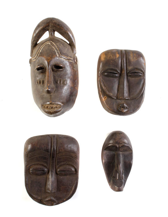 Bonhams Group Of Four Miscellaneous Miniature African Masks Height Of Largest 9 12 Inches