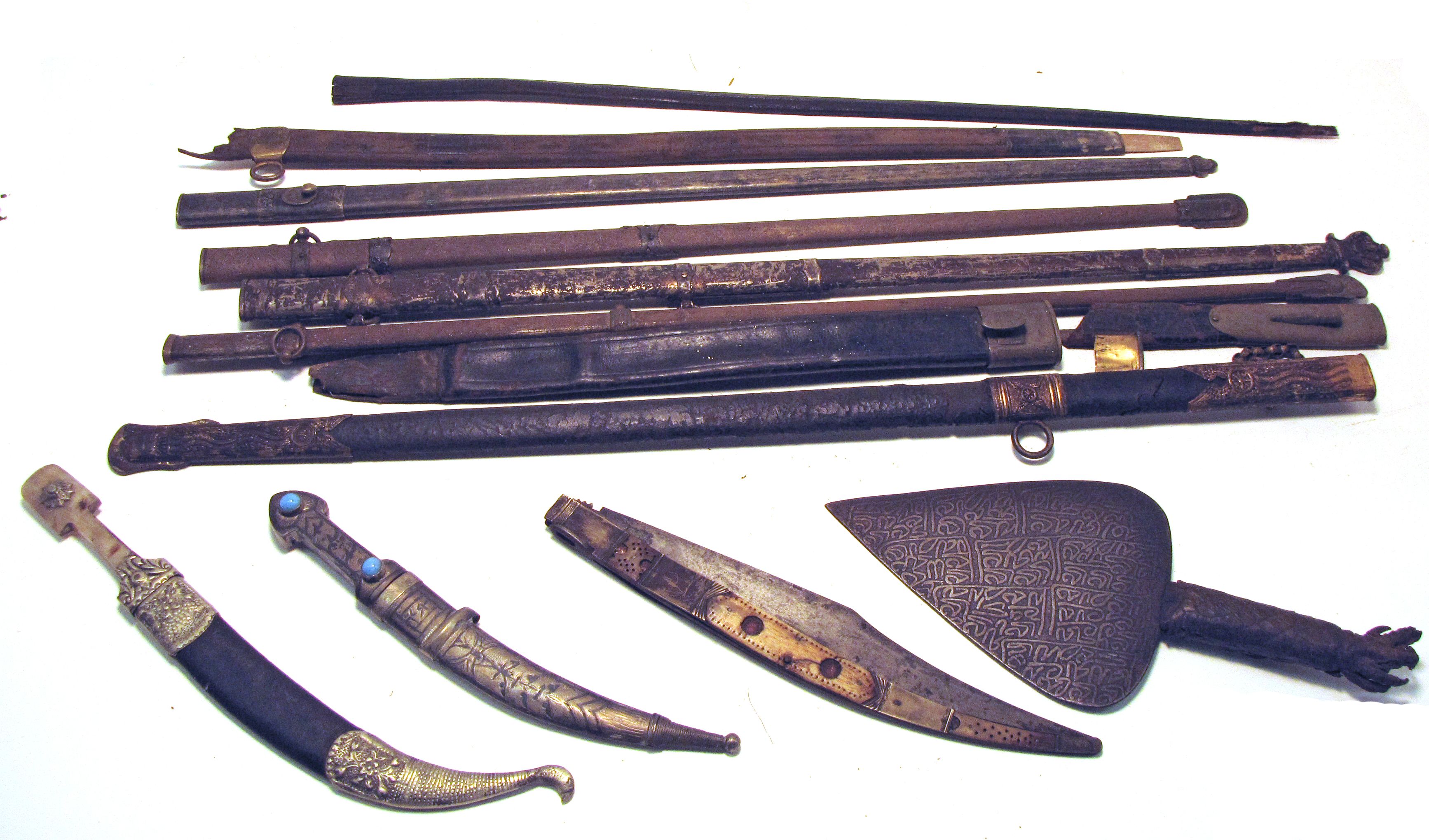 A group of edged weapons and scabbards - auctions & price archive