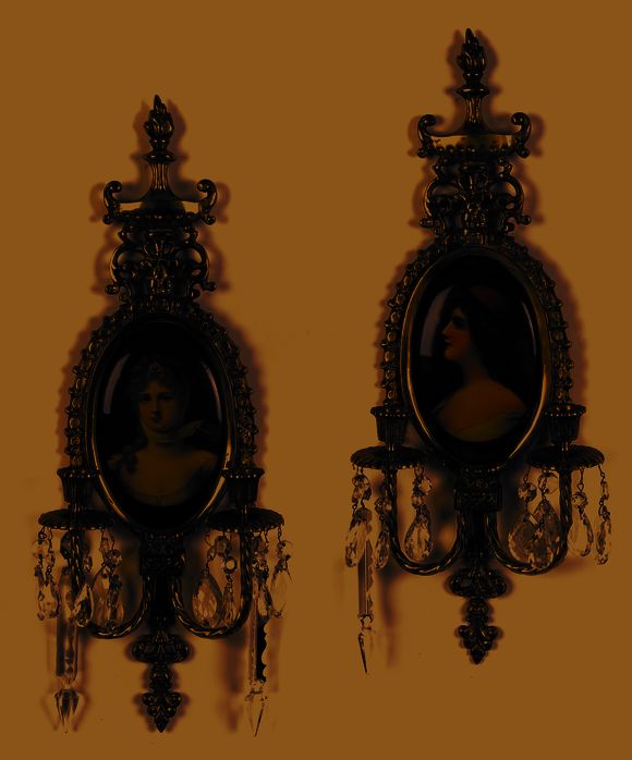 Bonhams : A pair of gilt brass two light wall sconces inset with ...