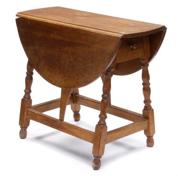 Bonhams : A Provincial style maple drop flap table