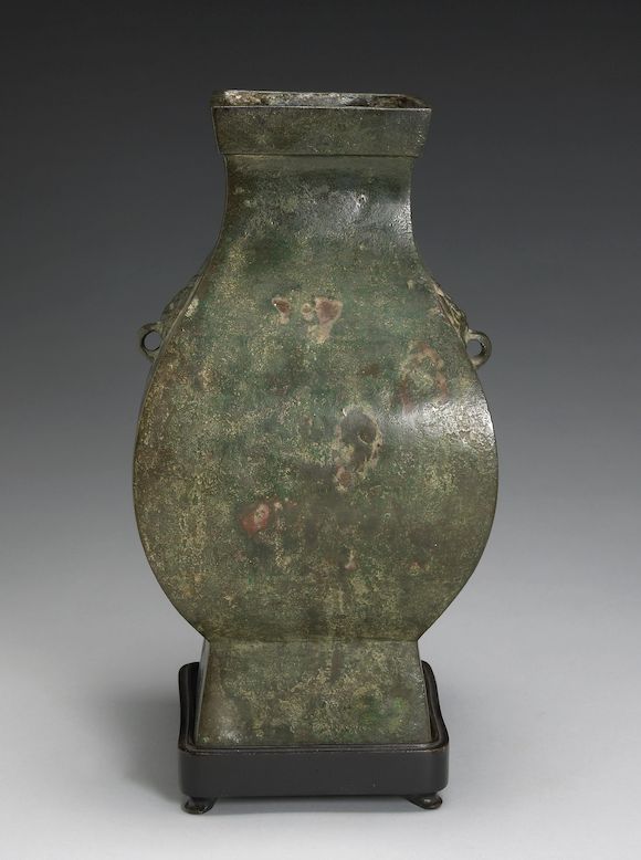 Bonhams : An archaistic cast metal hu