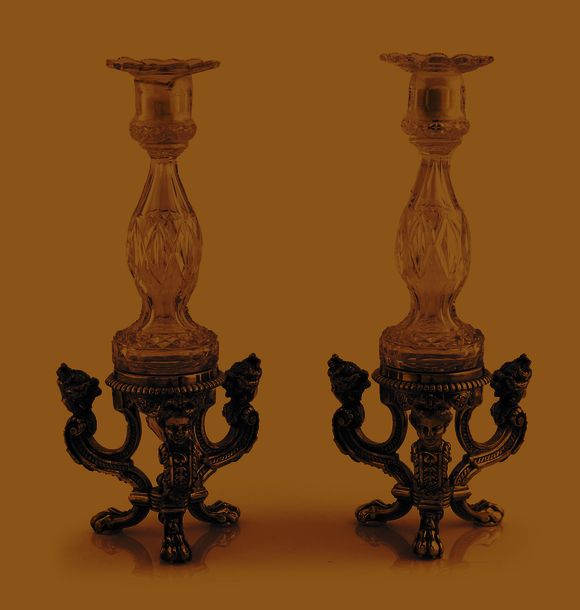 Bonhams : A silver plate and cut glass pair of candlesticks The ...