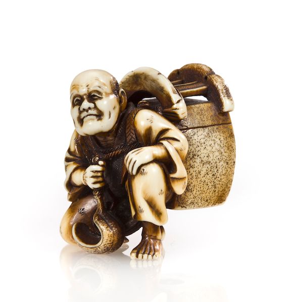 Bonhams : An ivory netsuke of a groom By Rakumin, 19th century