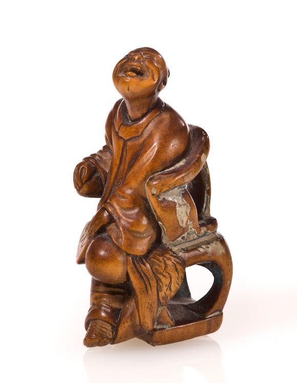 Bonhams : A rare painted wood netsuke of a Chinese man in a chair By ...
