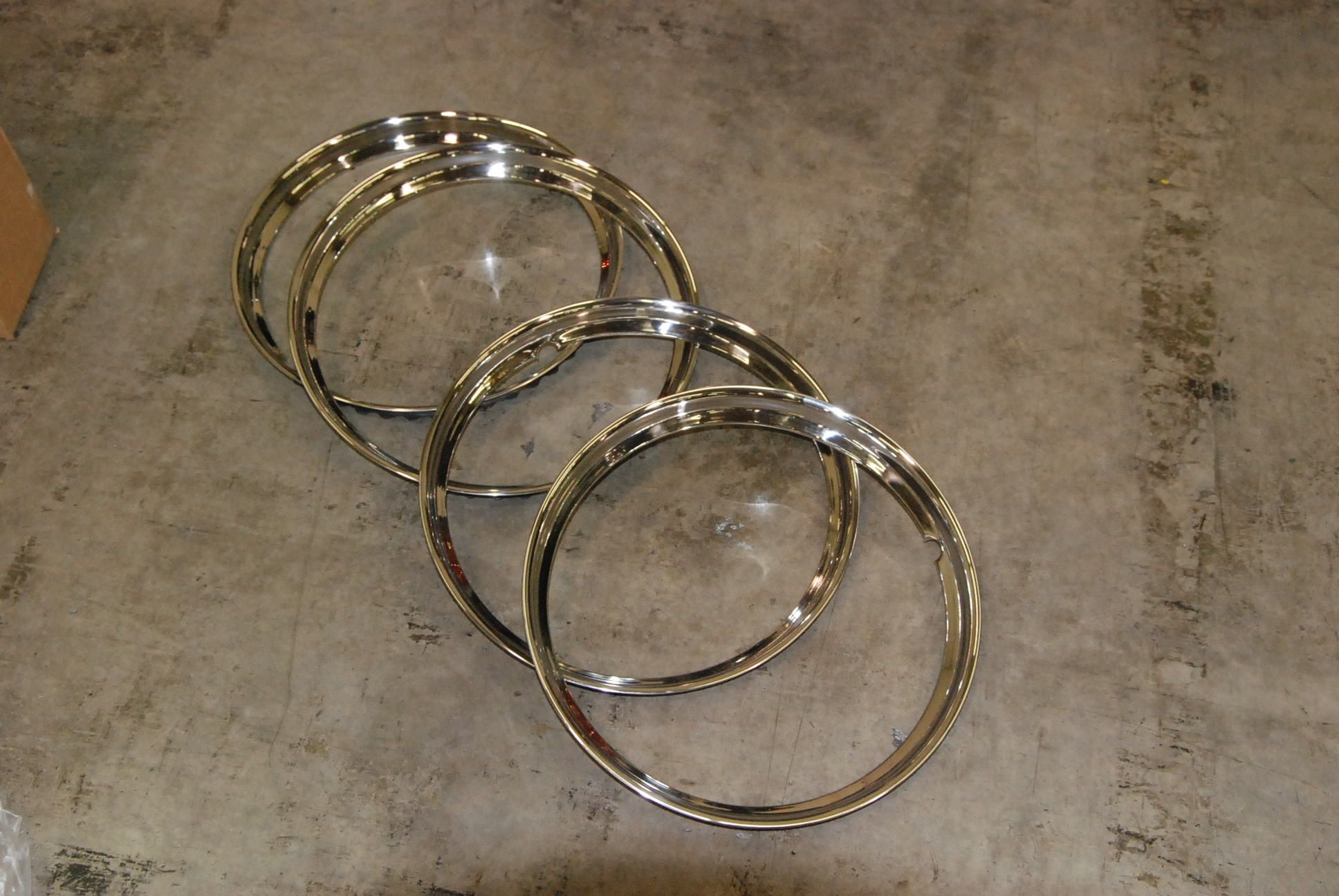 Bonhams Cars : A set of four 15" Beauty Rings,