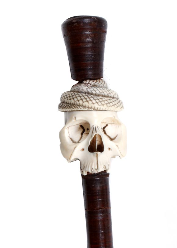 Bonhams : A walking stick with carved ivory skull and serpent knop