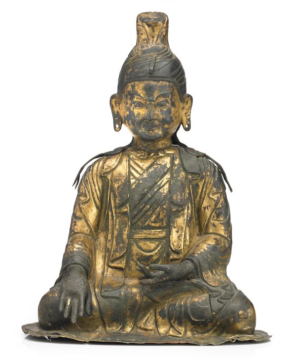 Bonhams : A gilt copper alloy repoussé figure of a Tibetan king ...