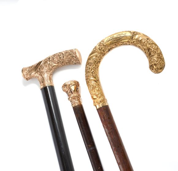 Bonhams : A group of three yellow gold-handled dress canes Late 19th ...