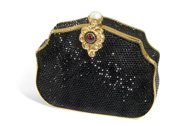 Bonhams : A black crystal scalloped purse with gold colored metal ...