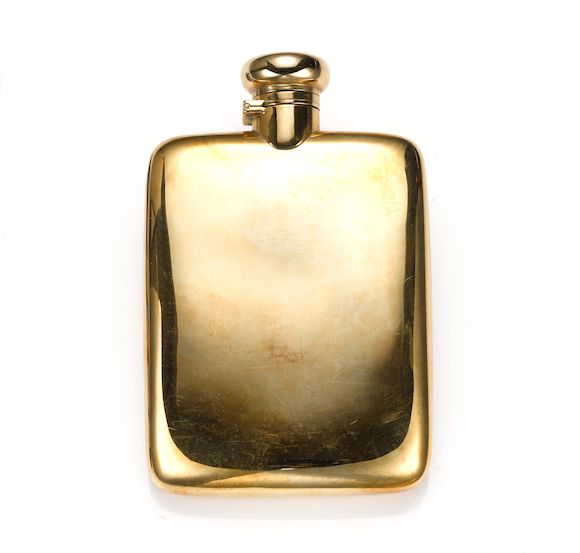Bonhams : An eighteen karat gold flask,