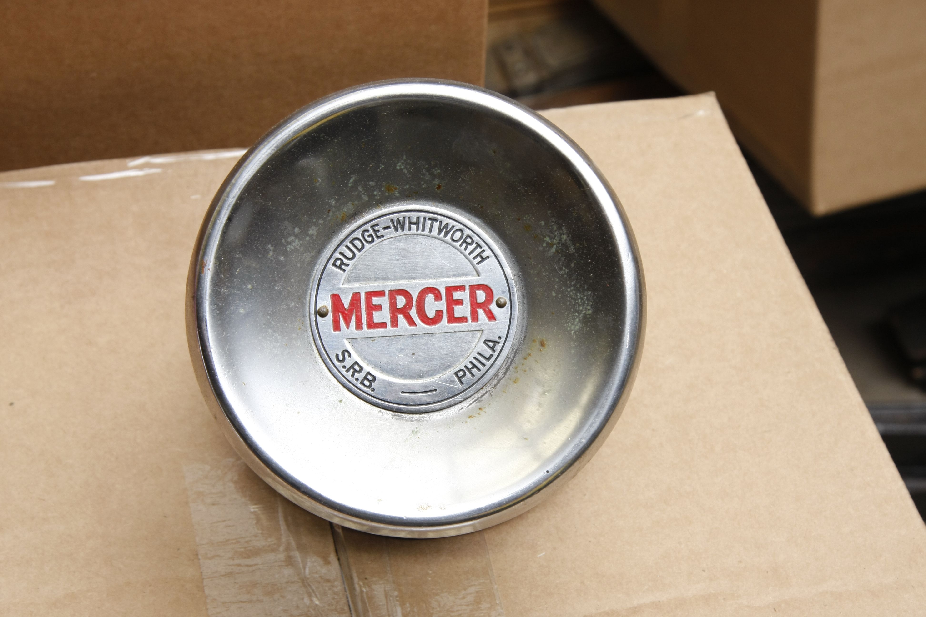 Bonhams Cars : A Spare tire center cap for an L-Head Mercer,
