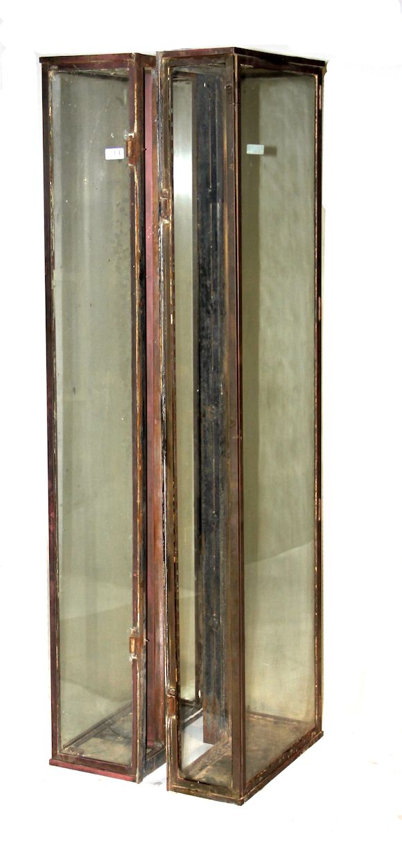 Bonhams : A set of three metal vitrine cabinets