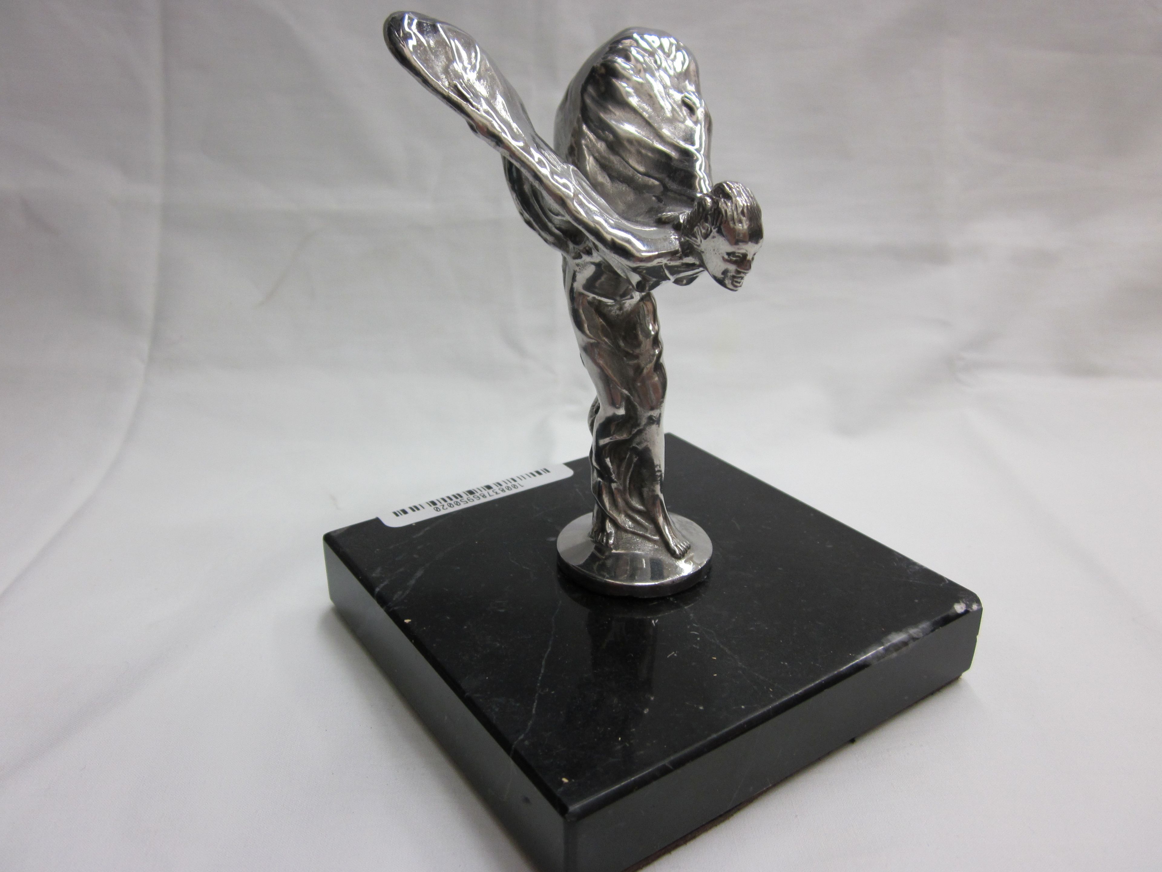 Bonhams Cars : A modern Rolls-Royce 'Spirit of Ecstacy' mascot desk piece,