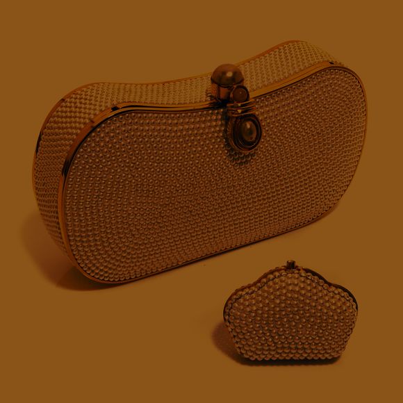 Bonhams : A kidney shaped white bead purse with a pink stone and ...
