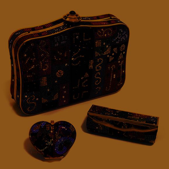 Bonhams : A multi-colored crystal purse together with a matching ...
