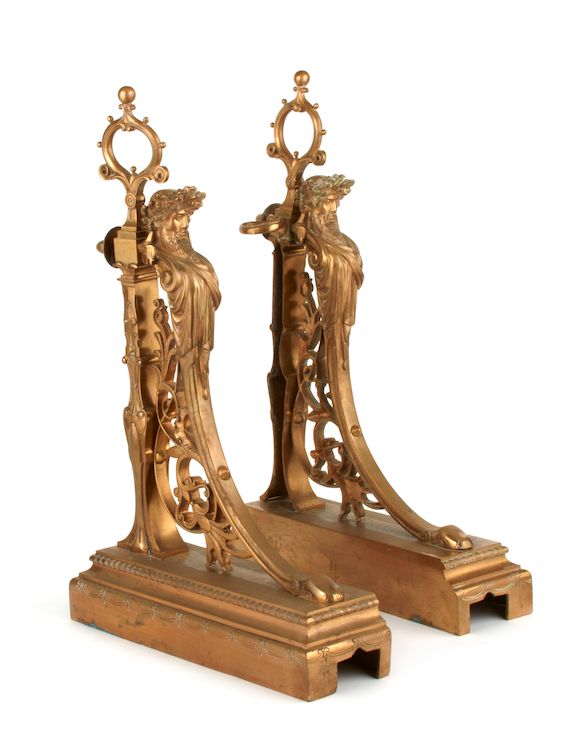 Bonhams : A pair of Baroque style gilt brass andirons