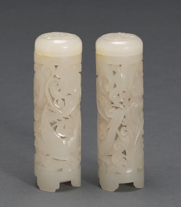 Bonhams : A pair of white nephrite reticulated covered vessels