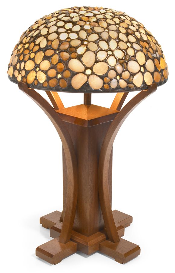 Bonhams : A beach pebble lamp with yellow rosetted center on bentwood ...