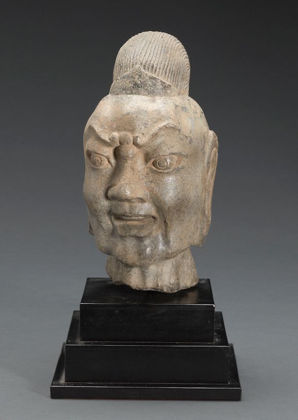Bonhams : A Tang style carved stone head of a lokapala