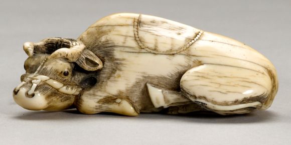Bonhams : An ivory figural netsuke 19th century, school of Tomotada