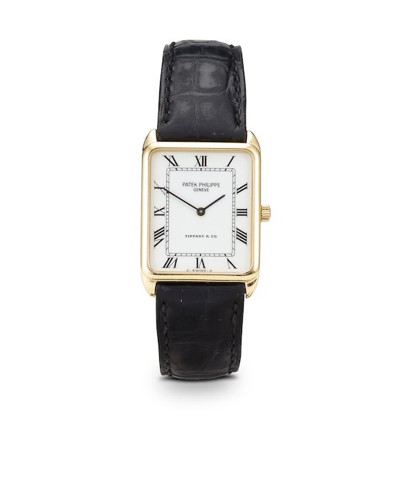 Bonhams : Patek Philippe. An 18K gold tank style rectangular wristwatch ...